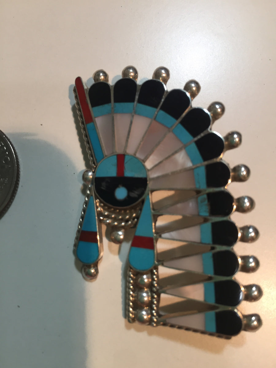 "The side view". Pin/ pendant – The Turquoise People