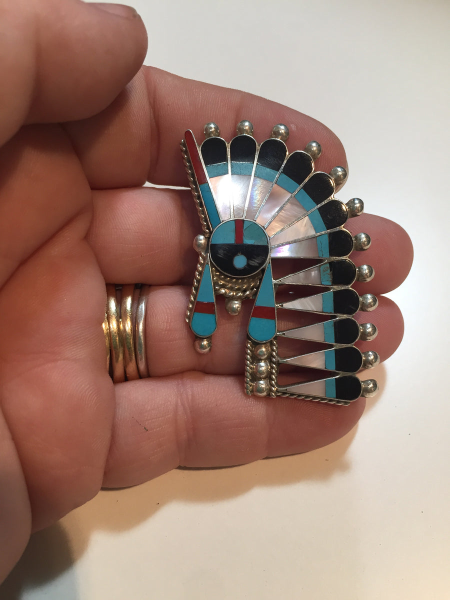 "The side view". Pin/ pendant – The Turquoise People